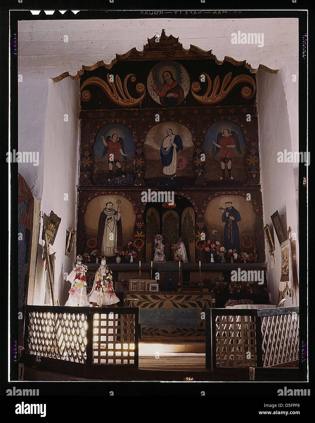 A photograph from the 1940s of the main altar in a church in Trampas ...