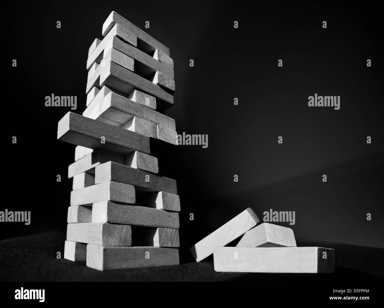 Wooden blocks tower Black and White Stock Photos & Images - Alamy