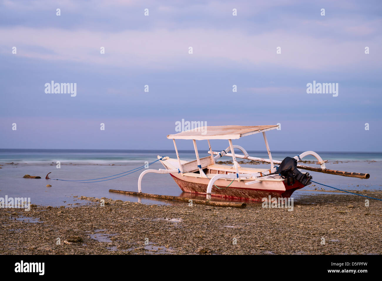 Boat with wings on beach in sunset time at low tide, Indonesia Stock ...
