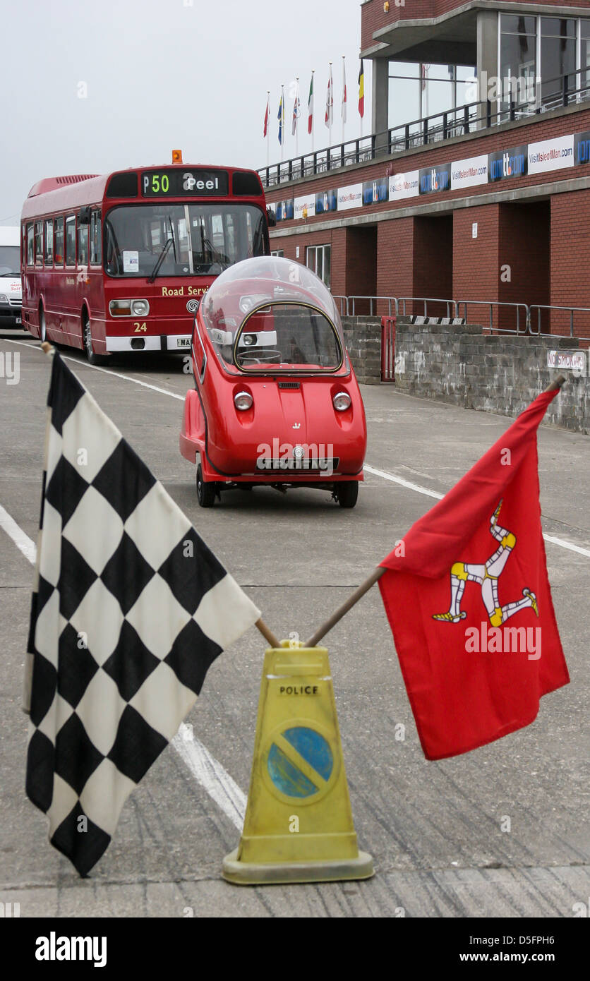 Red P50 3-wheel car in front of TT Grandstand, Isle of Man Stock Photo ...