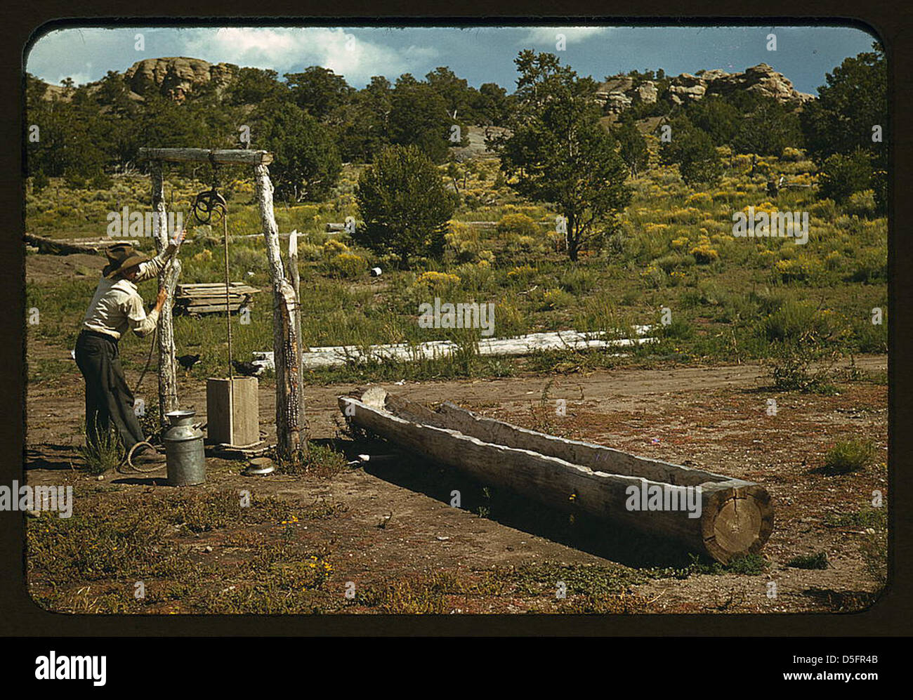 Faro Caudill drawing water from his well, Pie Town, New Mexico (LOC ...