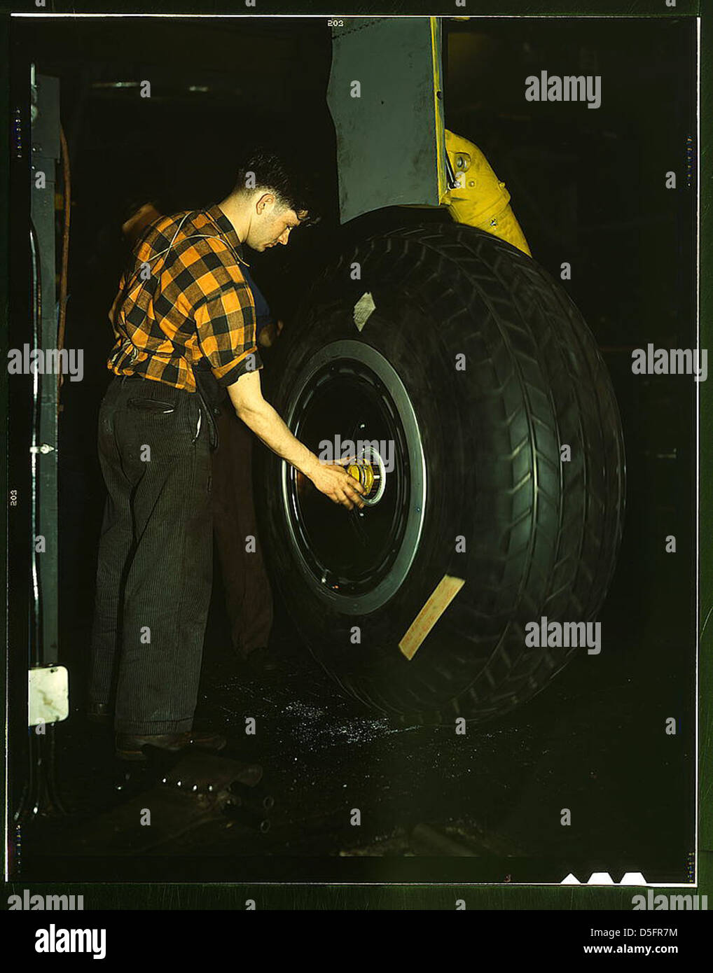 A photograph from World War II showing an inspection of the landing ...
