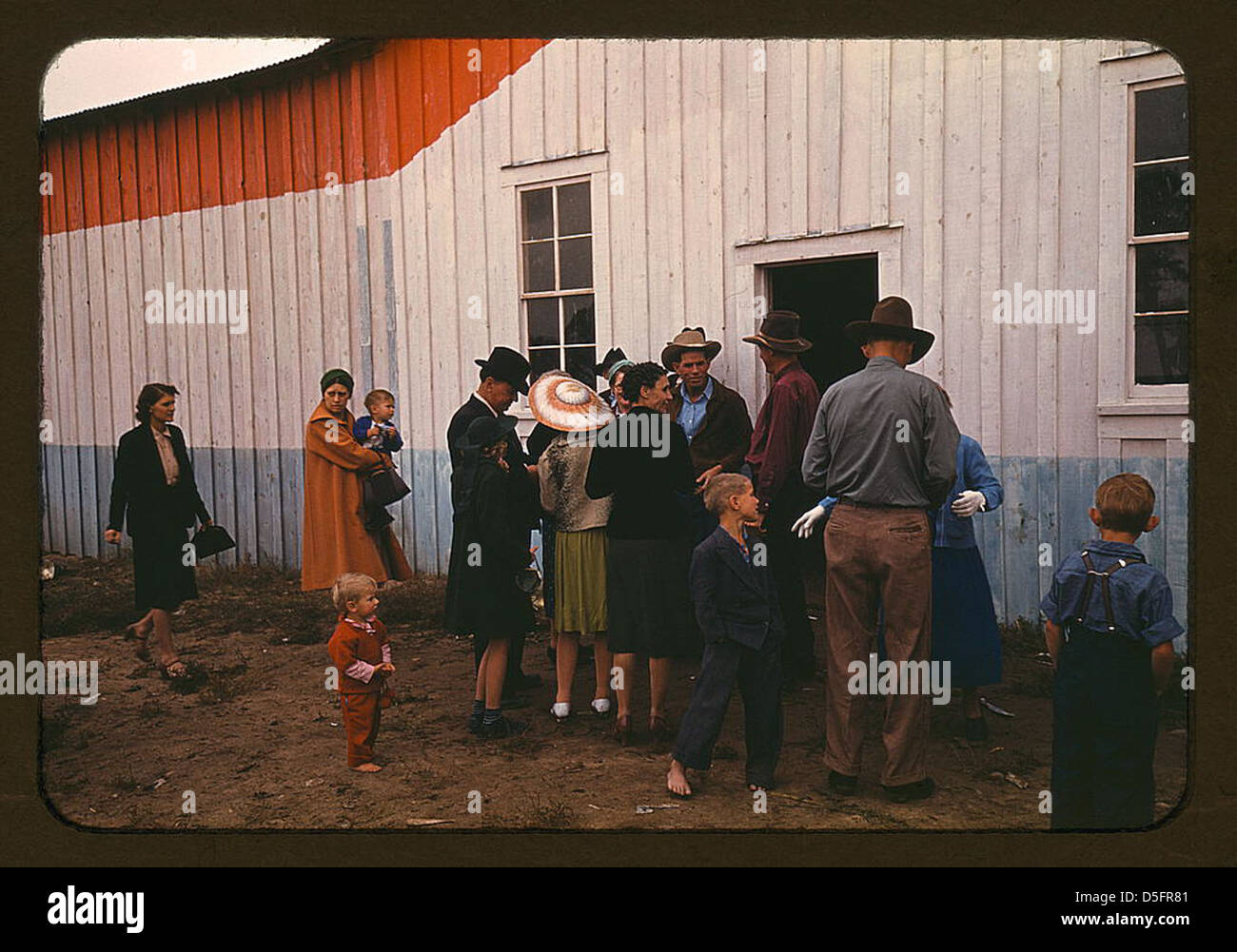 This 1940s image shows a group of homesteaders standing in front of the ...