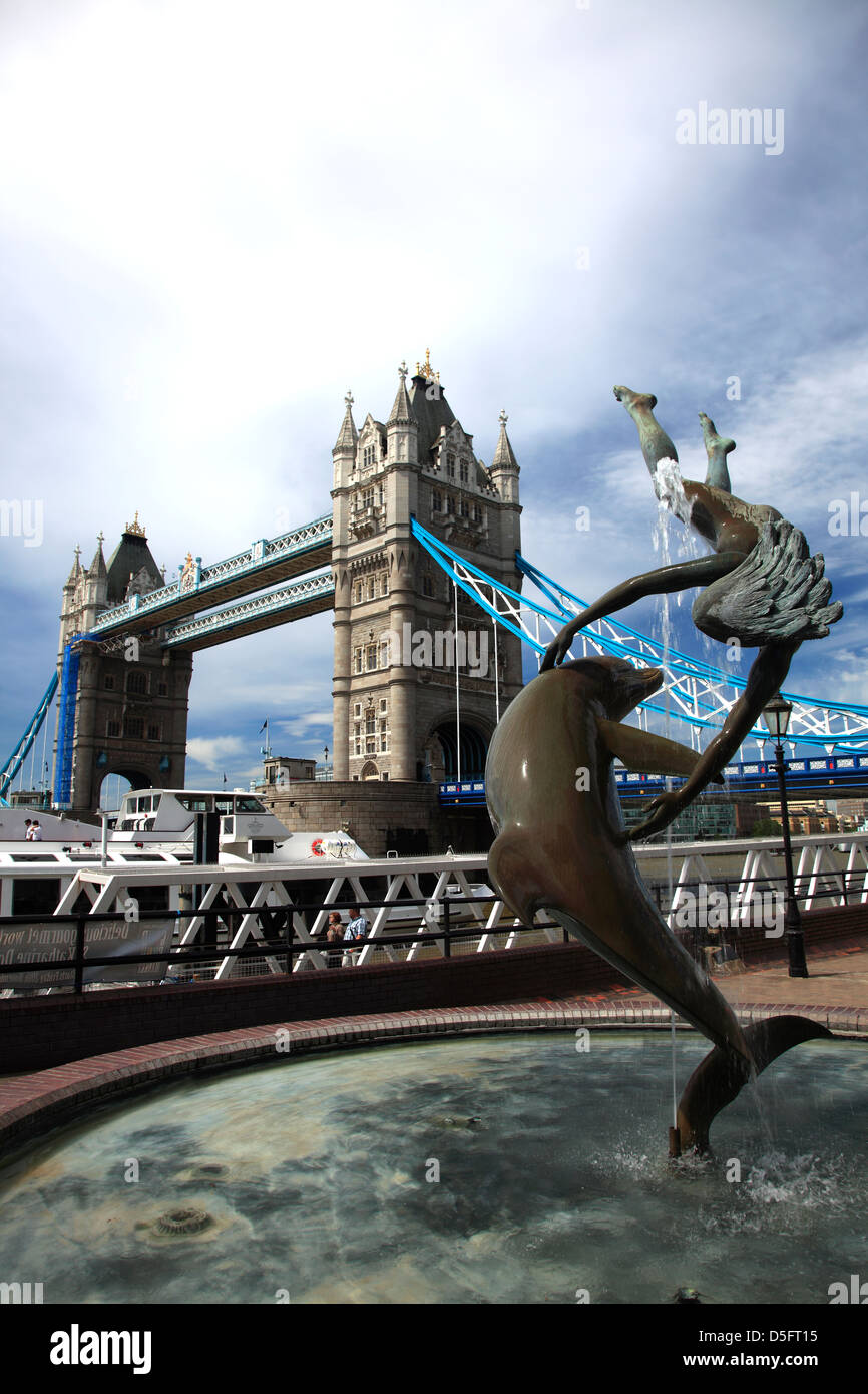 Girl and Dolphin Statue, North Bank, Tower Bridge over the River Thames ...