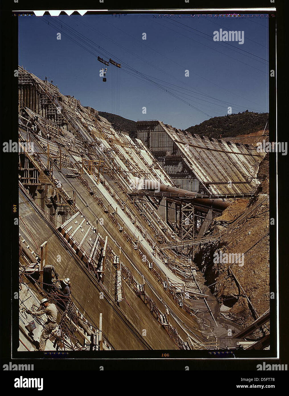 A photograph showing the construction of the Shasta Dam in California ...