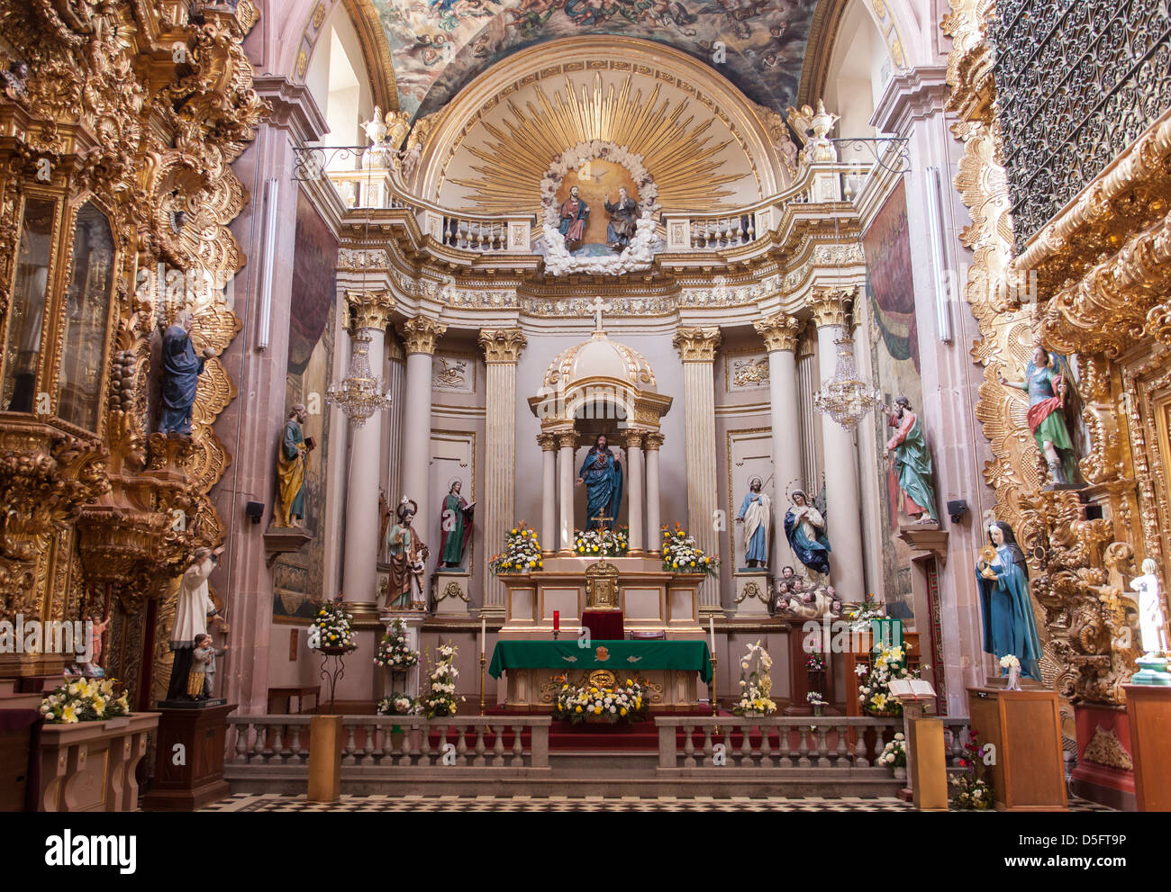 Ornate, gold interior of the Church of the Monastery of Santa Clara of ...