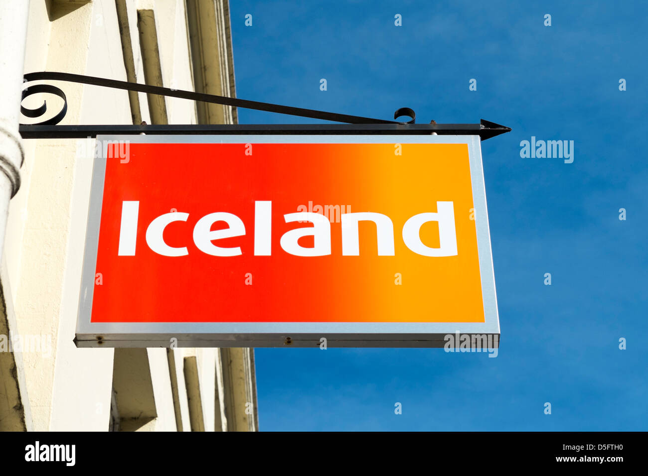 Looking up at Iceland supermarket sign and logo above the entrance to ...