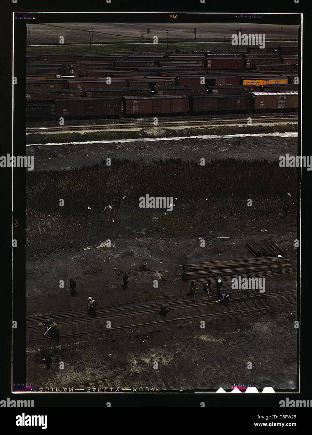 A photograph from 1943 showing the section crew of the Chicago ...