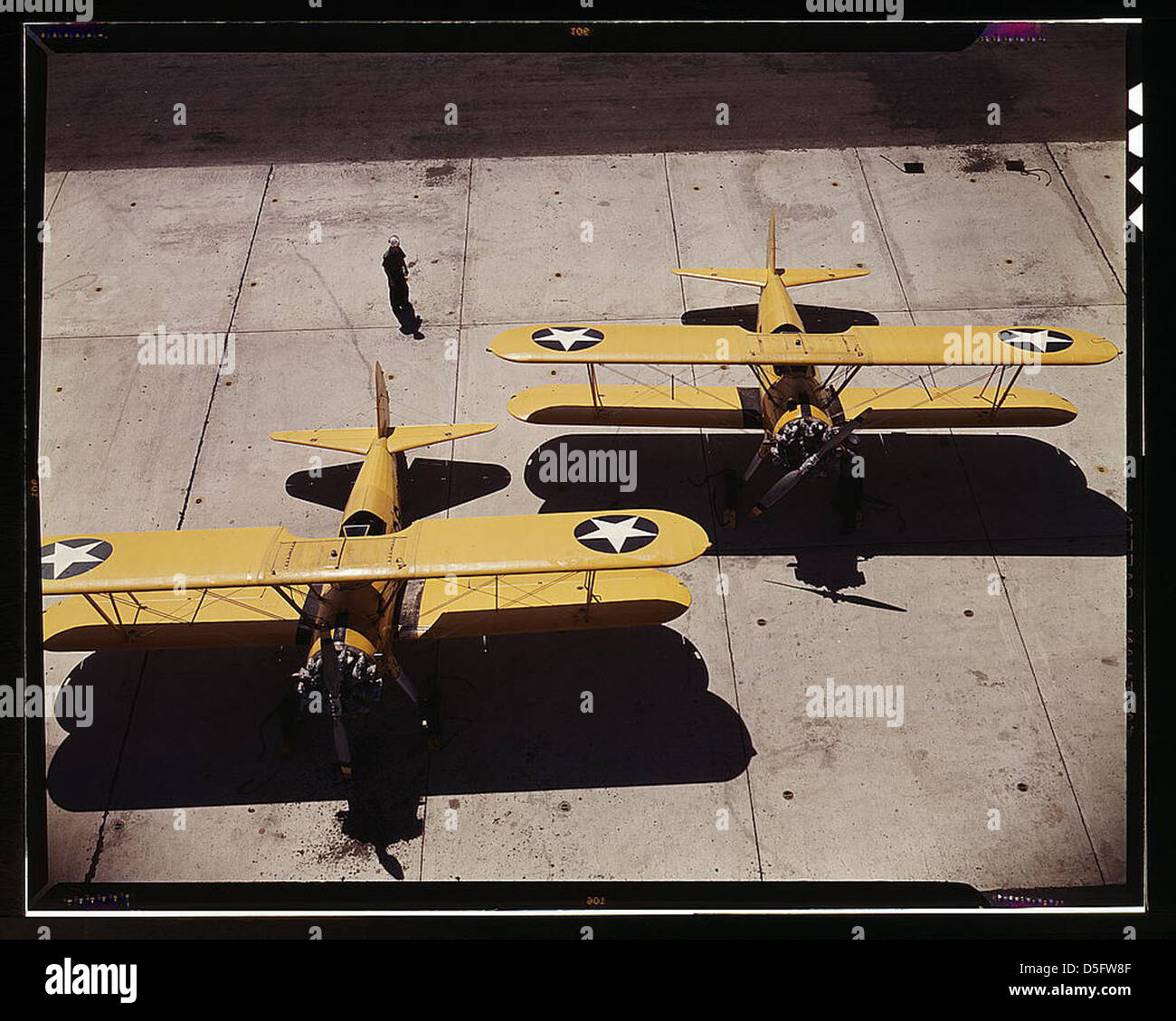 A 1942 photograph captures Navy N2S biplanes at the Naval Air Base in ...