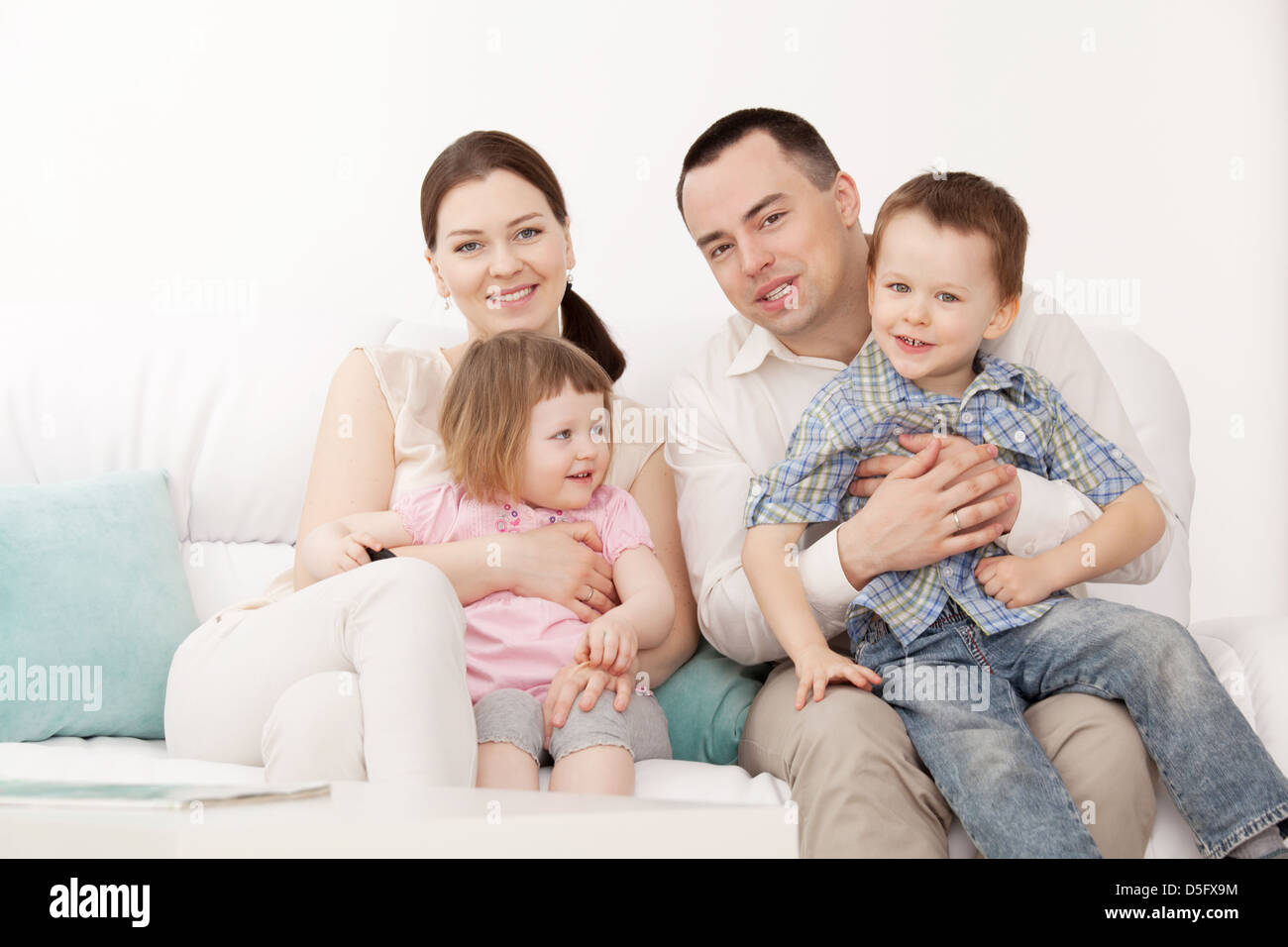 Beautiful happy family Stock Photo - Alamy