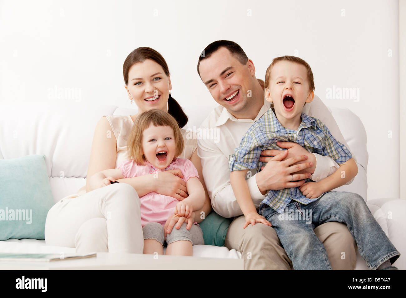 Beautiful happy family Stock Photo - Alamy