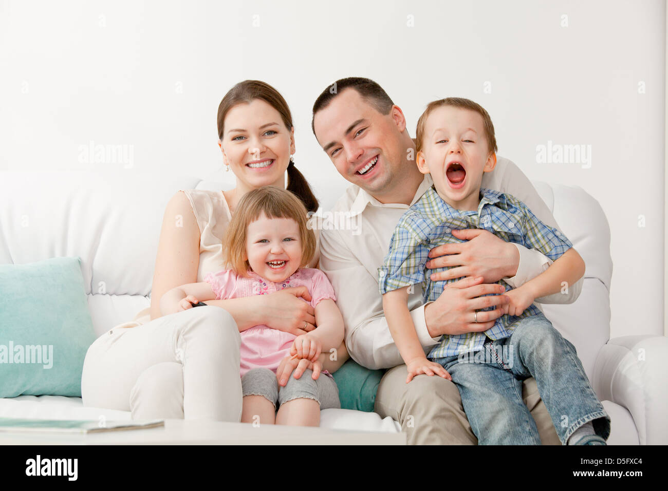 Beautiful happy family Stock Photo - Alamy