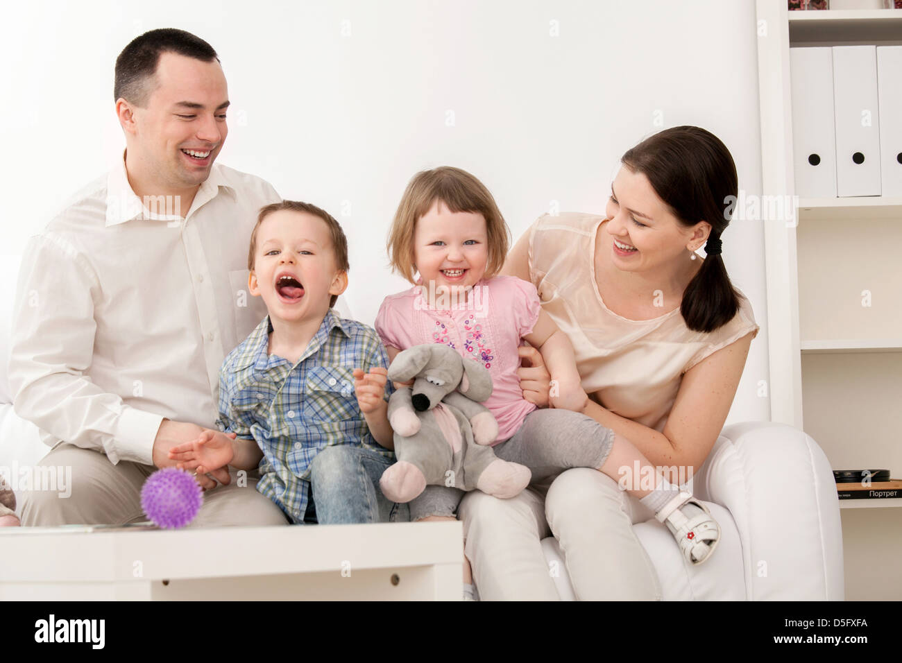 Beautiful happy family Stock Photo - Alamy