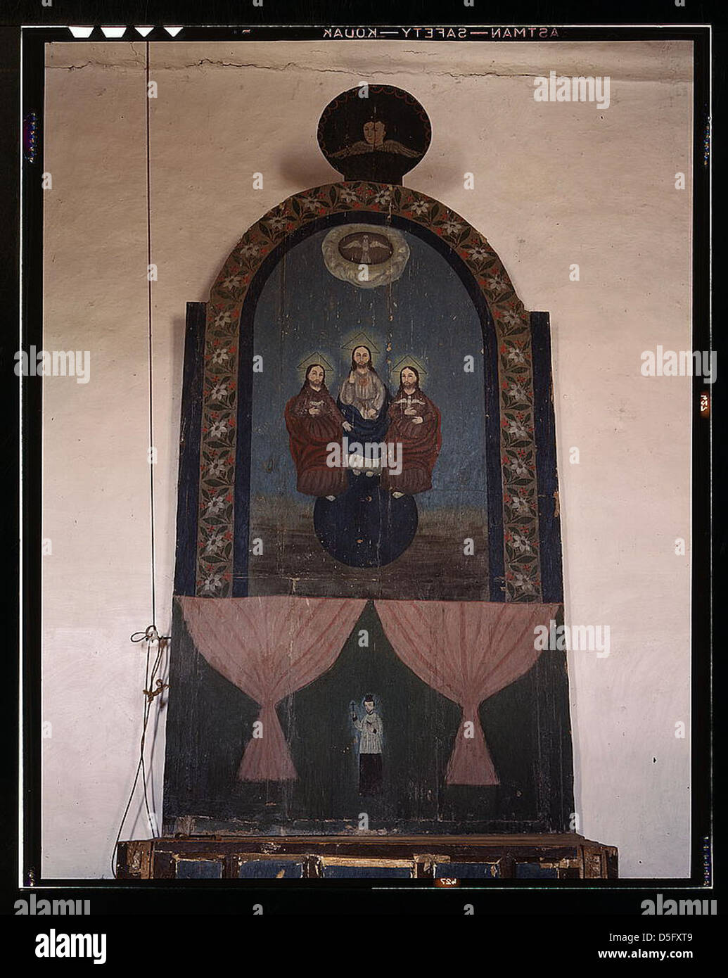 A vintage photograph of an altar dedicated to the Holy Trinity in a ...