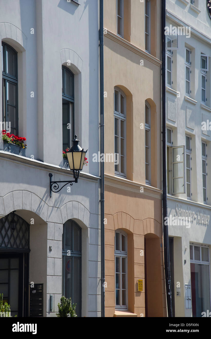 House wall front facing town square Stock Photo - Alamy