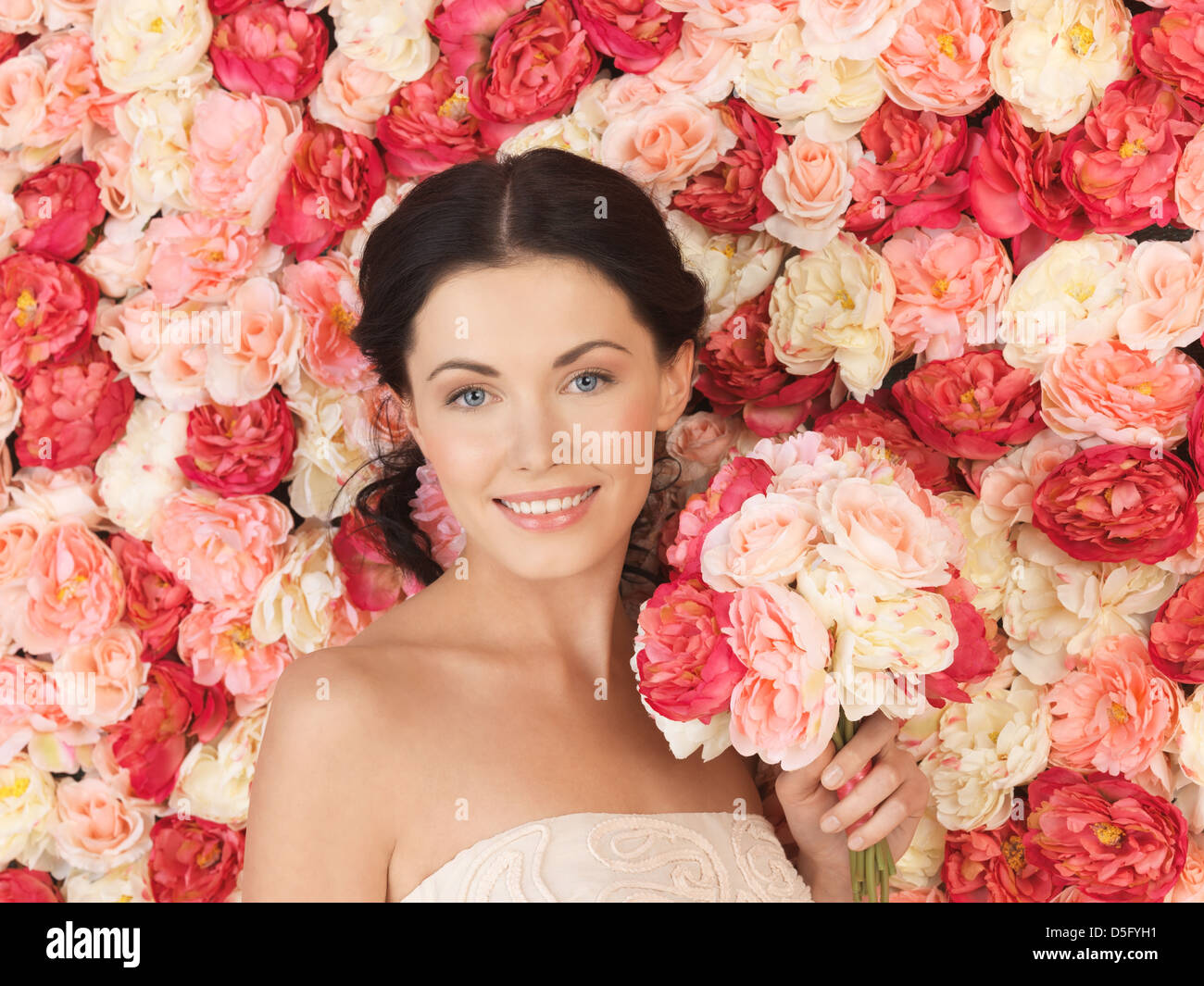 woman with background full of roses Stock Photo - Alamy
