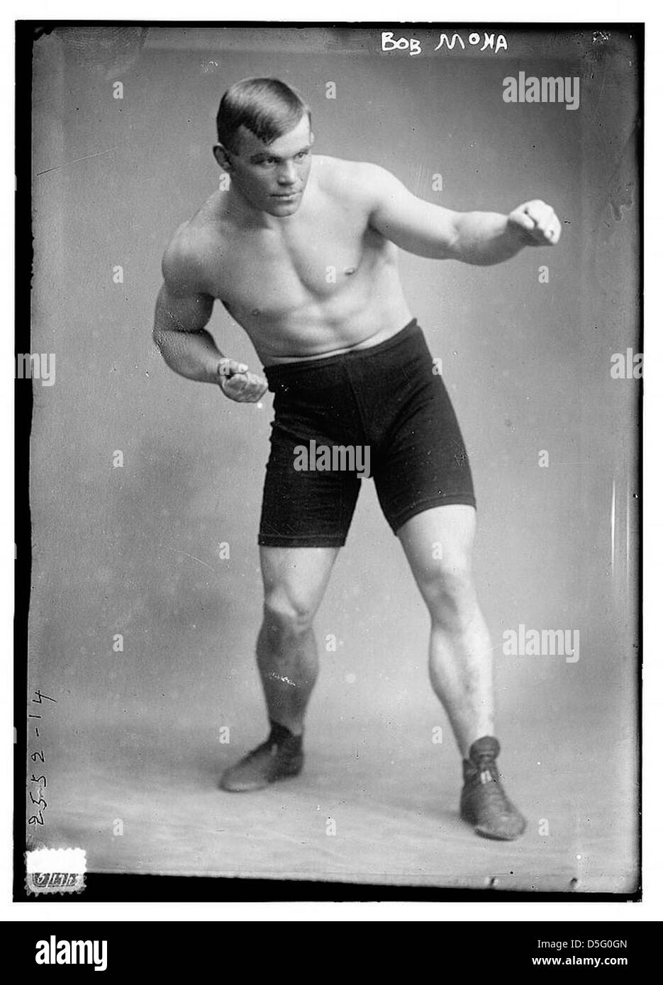 Bob Moha, an American boxer, is captured in a historic photograph ...