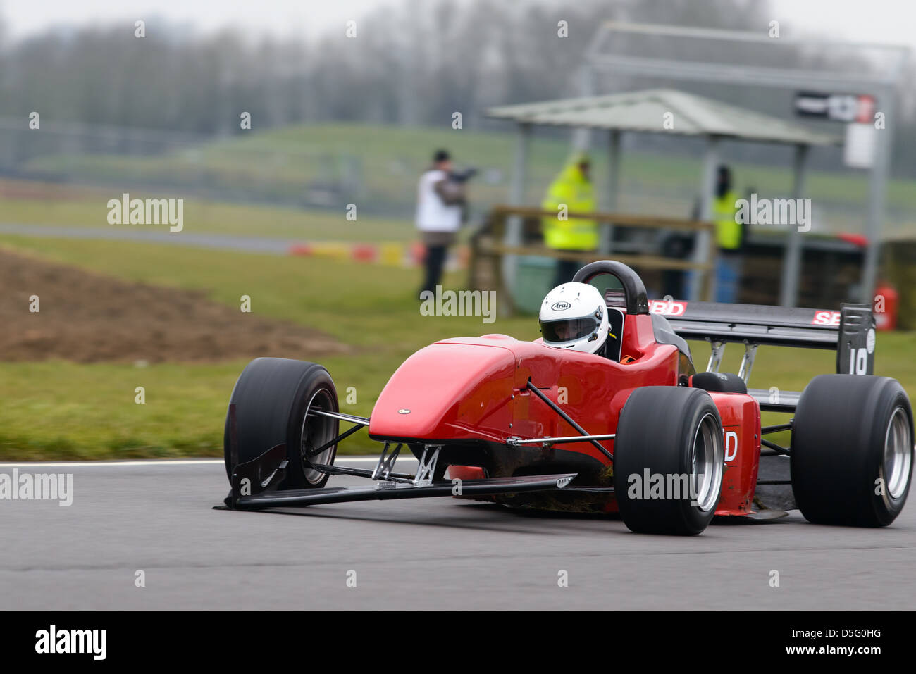 A car racing around Castle Combe Circuit at the Bristol Motor Club's ...