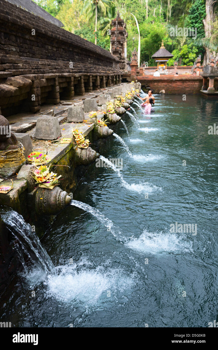 Holy spring water in Tirta Empul temple, Bali, Indonesia Stock Photo ...