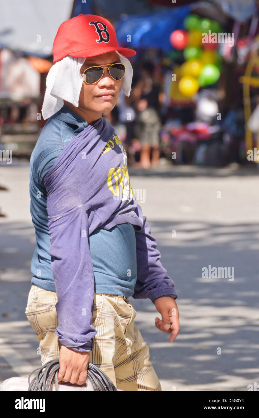 Street scene. Puerto Galera, Philippines, Asia. Asian man, typical ...