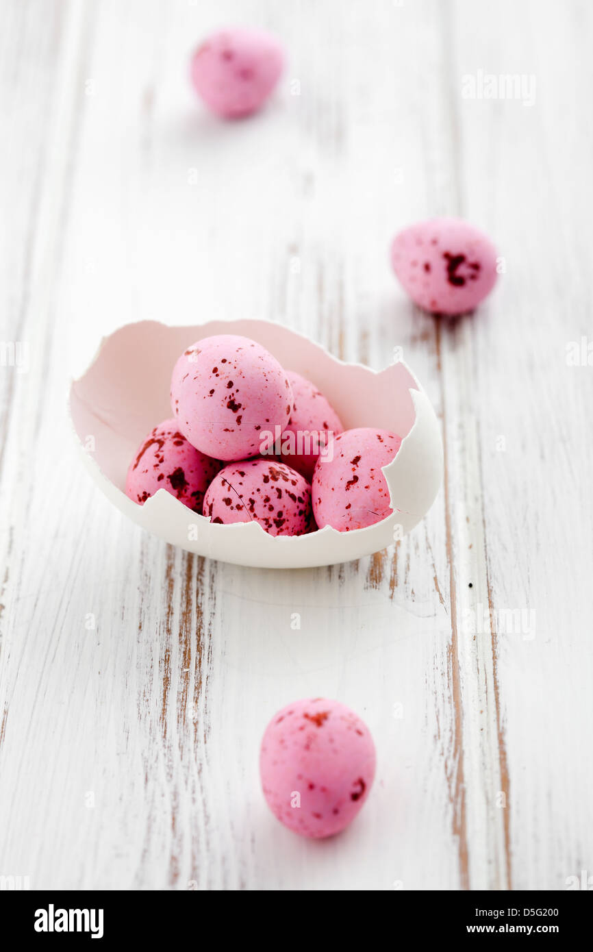 Broken egg shell with pink easter eggs Stock Photo - Alamy