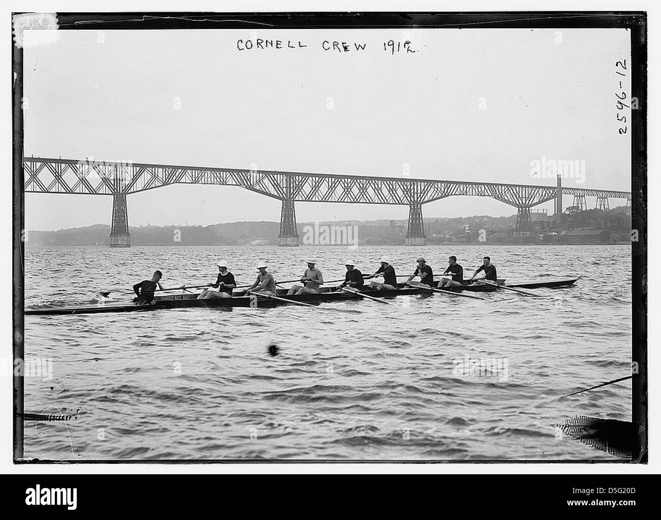 A 1912 photograph showing the Cornell University rowing team during a ...