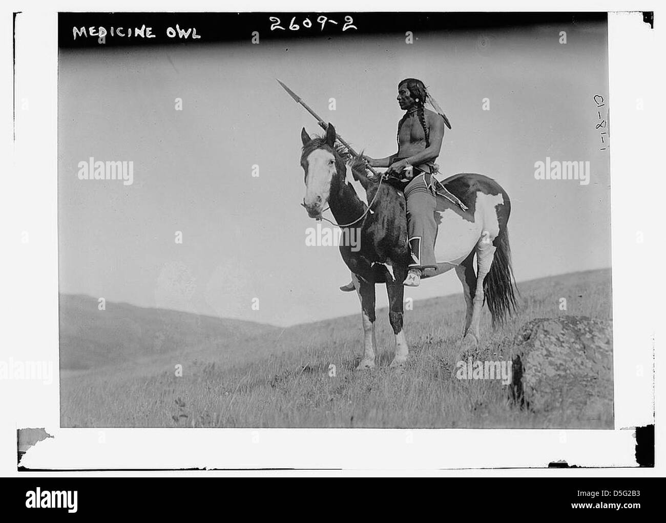 A Native American, identified as Medicine Owl, is pictured on a pony in ...