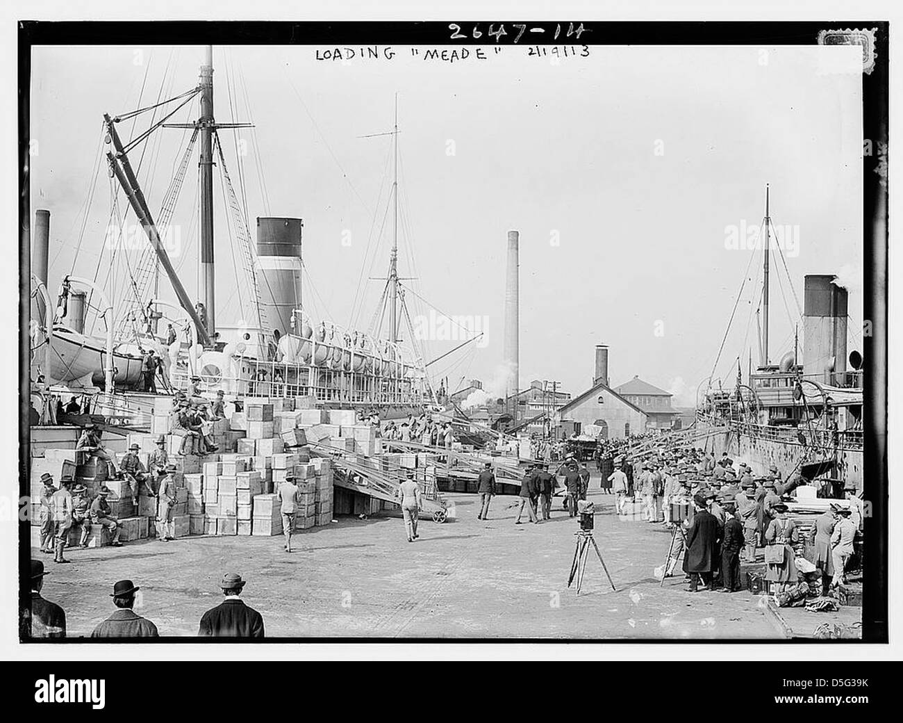 The image depicts the loading of the SS Meade, a troop transport ship ...