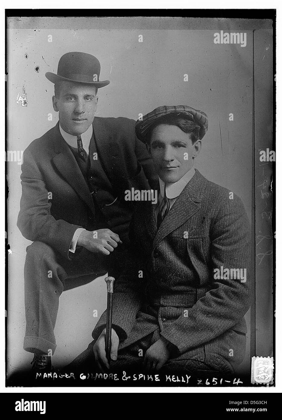 Manager Gilmore and boxer Spike Kelly are pictured together ...
