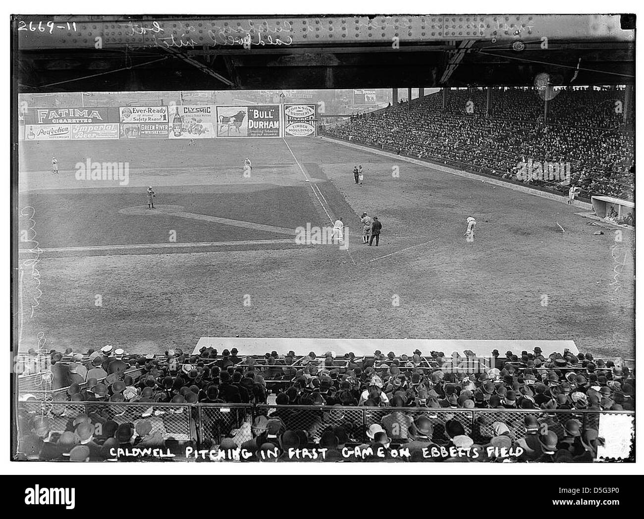 Ray Caldwell is captured pitching in the first game at Ebbets Field ...