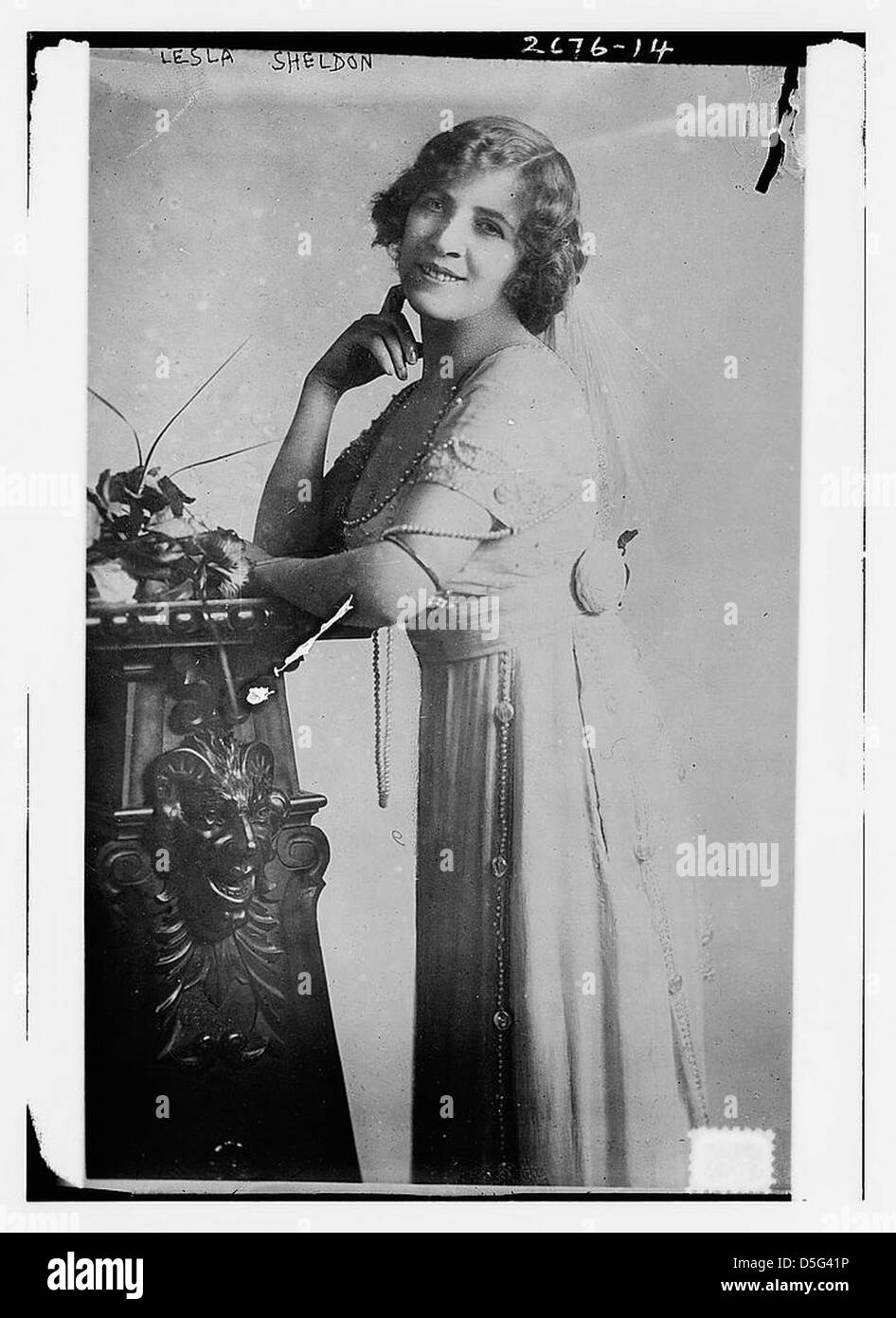 Lesla Sheldon, an actress, is seen in a posed photograph. The image ...