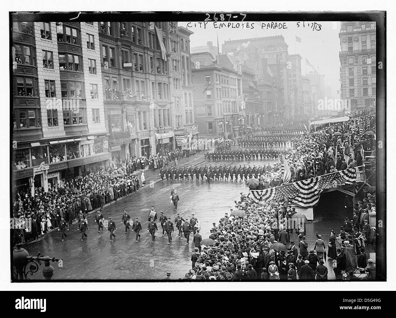 A 1913 parade featuring city employees marching through the streets ...