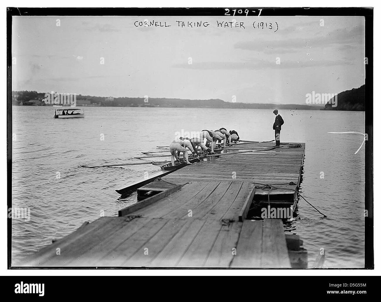 This photo shows the Cornell crew team taking water during a rowing ...