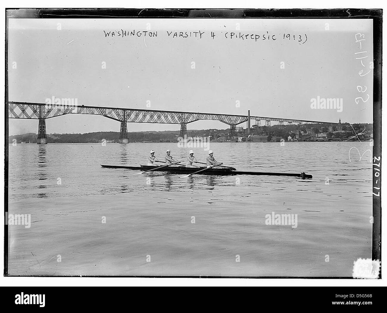 The University of Washington’s varsity rowing team competes in the 1913 ...