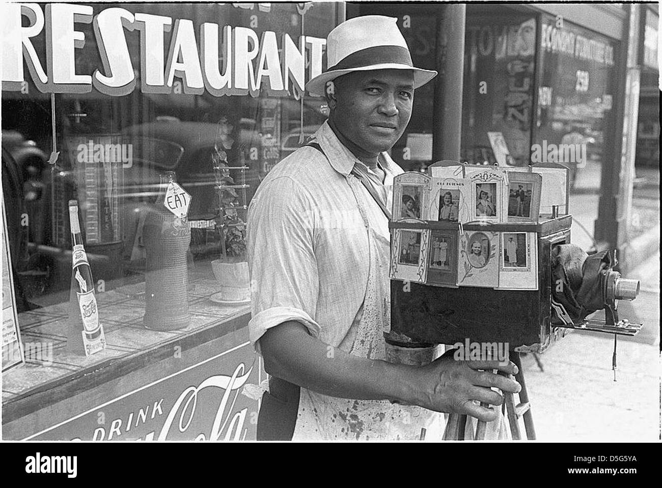An itinerant photographer captures street scenes in Columbus, Ohio, in ...