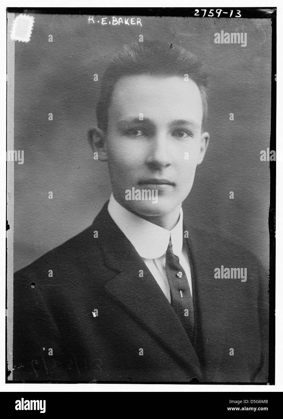 This portrait of R.E. Baker features a man with a brushcut and wearing ...