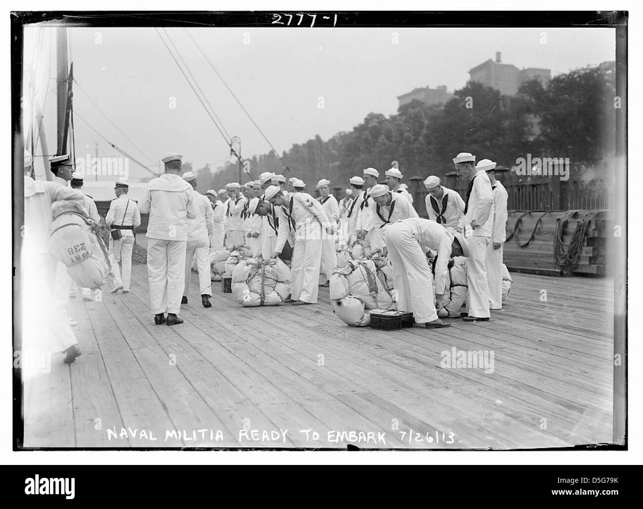 This photograph shows the U.S. Naval Militia preparing to embark on the ...