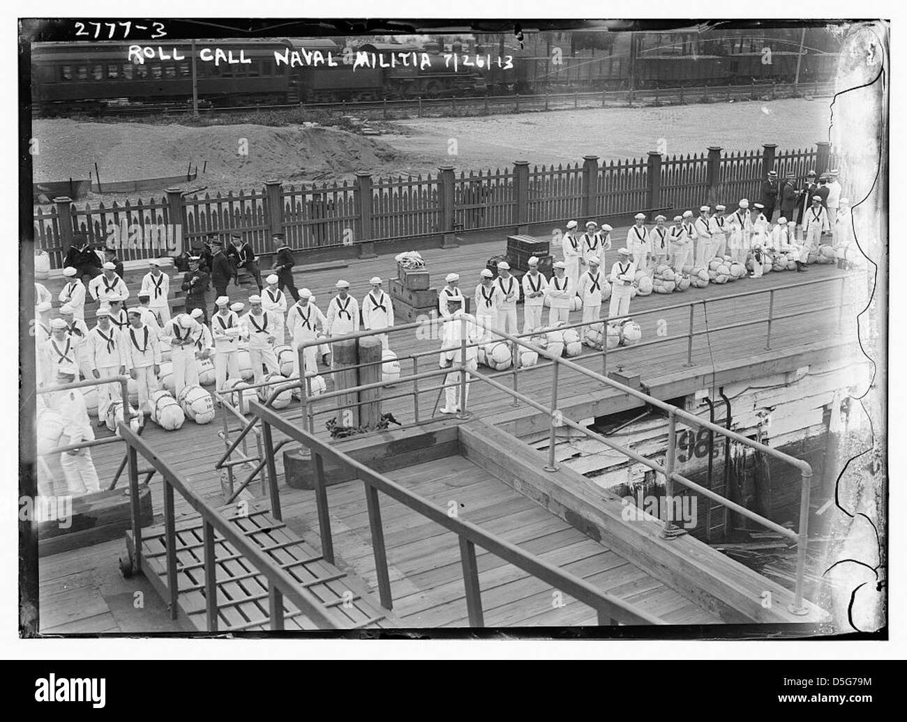 This 1913 photo captures a roll call of the Naval Militia, with sailors ...