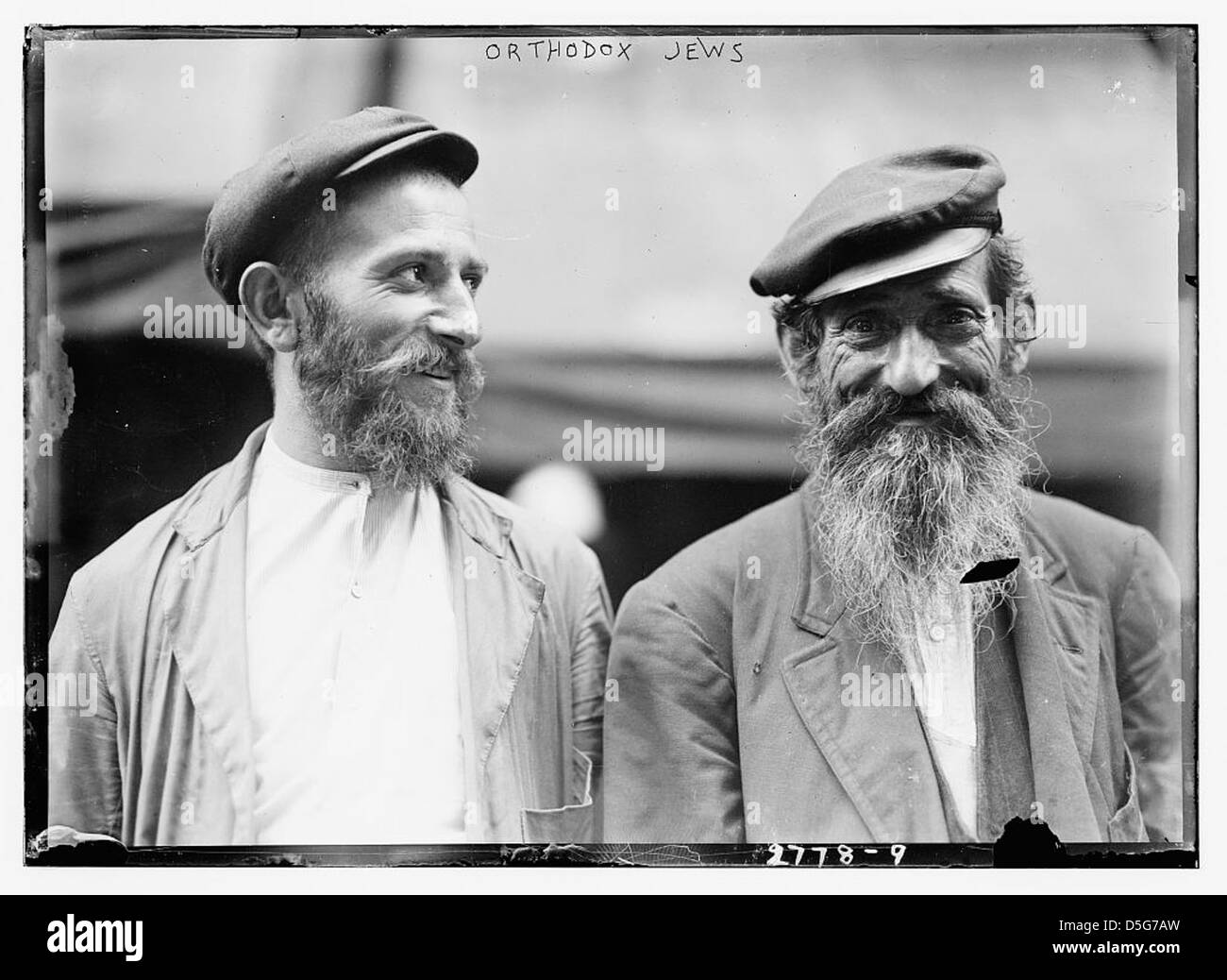 A portrait of two Orthodox Jewish men, featuring traditional attire ...
