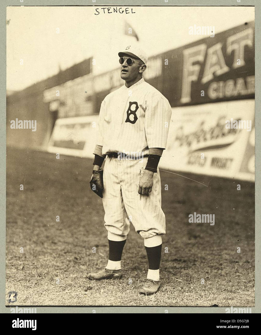 Casey Stengel, wearing sunglasses, is depicted in a full-length ...