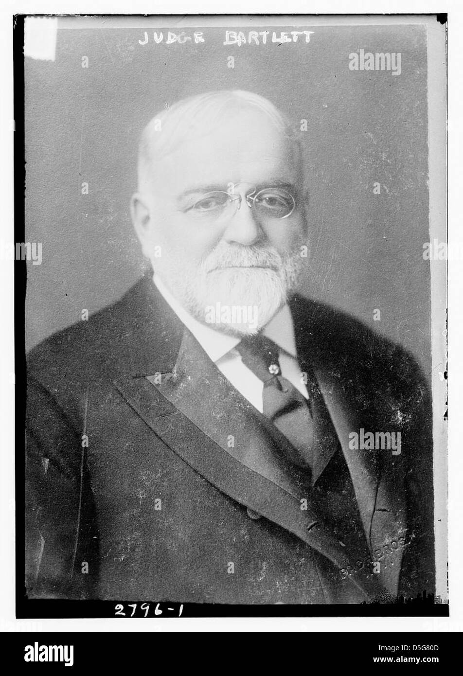 A portrait of Judge Bartlett, featuring his distinctive beard and pince ...
