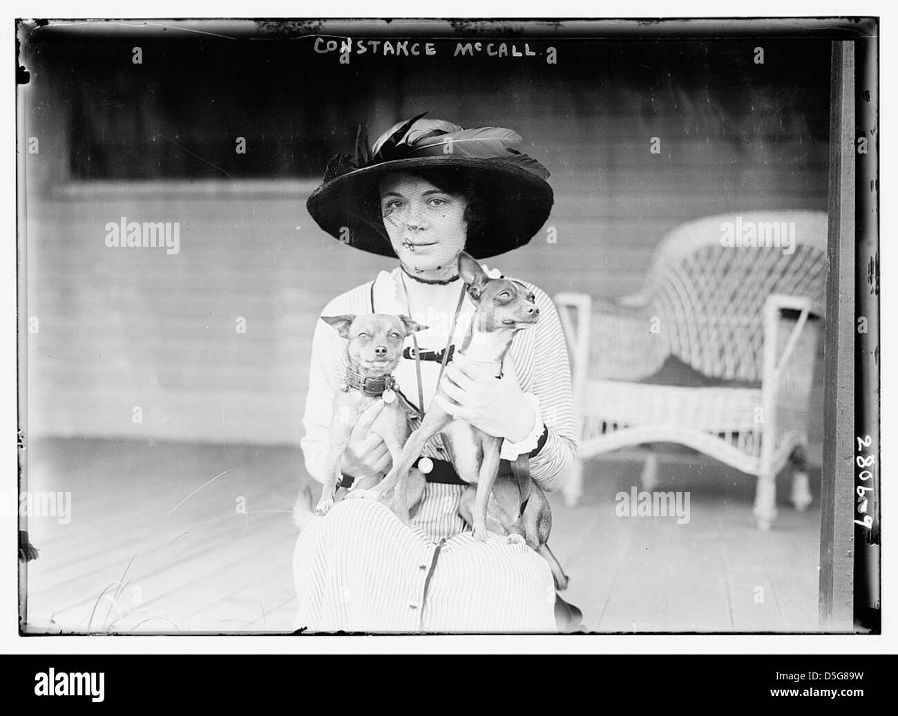 This portrait features Constance McCall, a seated woman wearing a ...