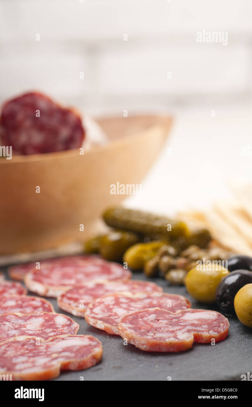 fresh cold cut platter with pita bread and pickles antipasti Stock ...