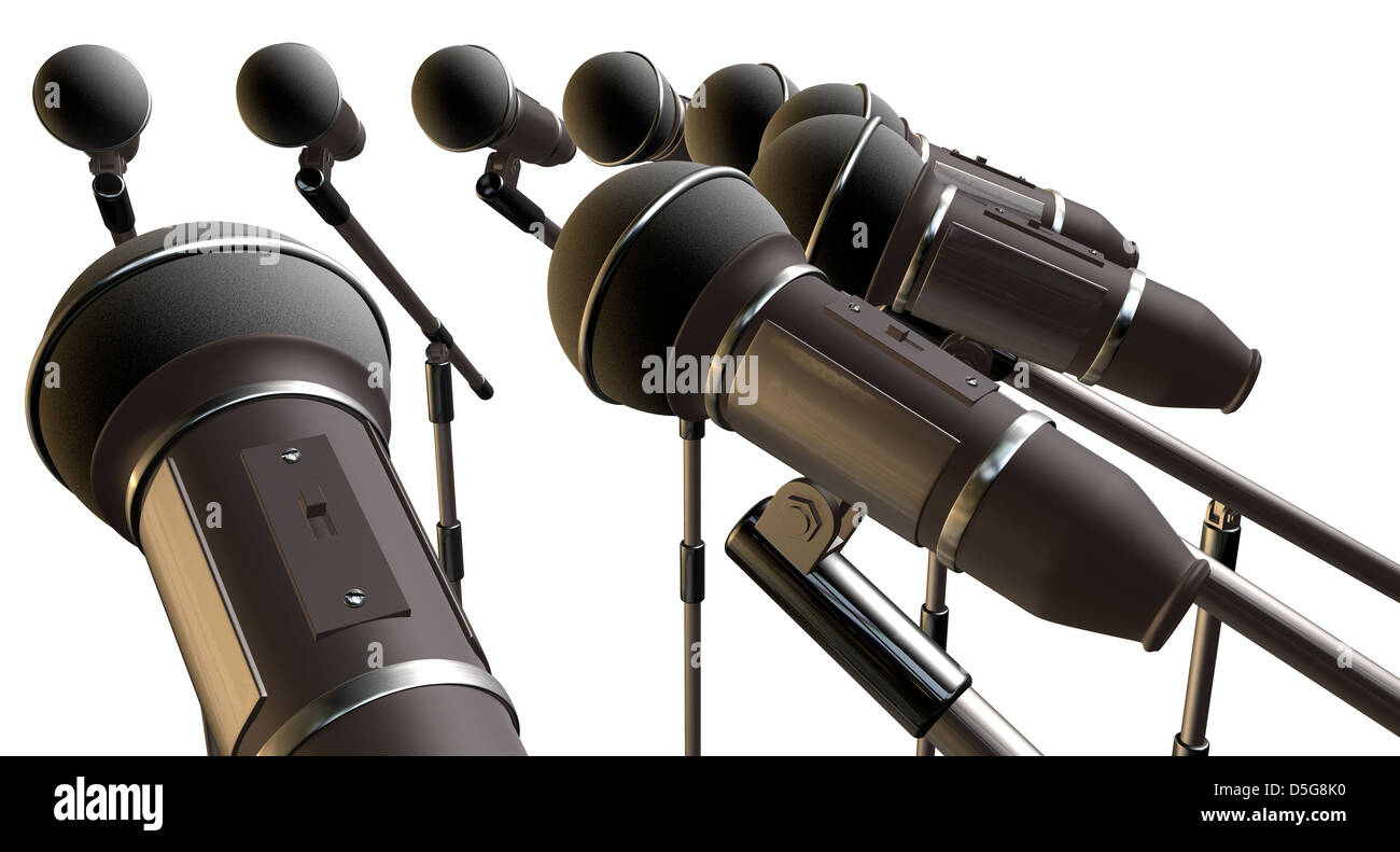 An array of black plastic and foam microphones on stands facing inwards ...