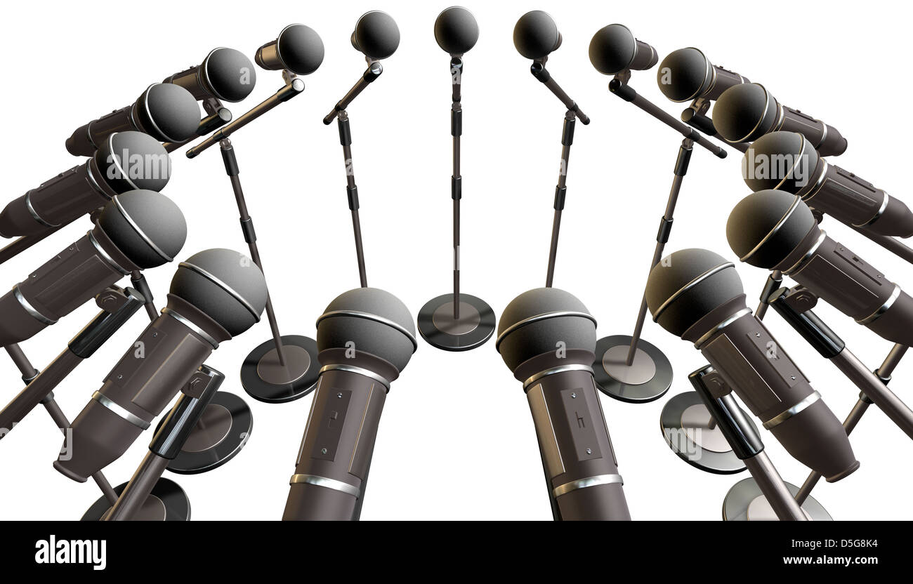 An array of black plastic and foam microphones on stands facing inwards ...