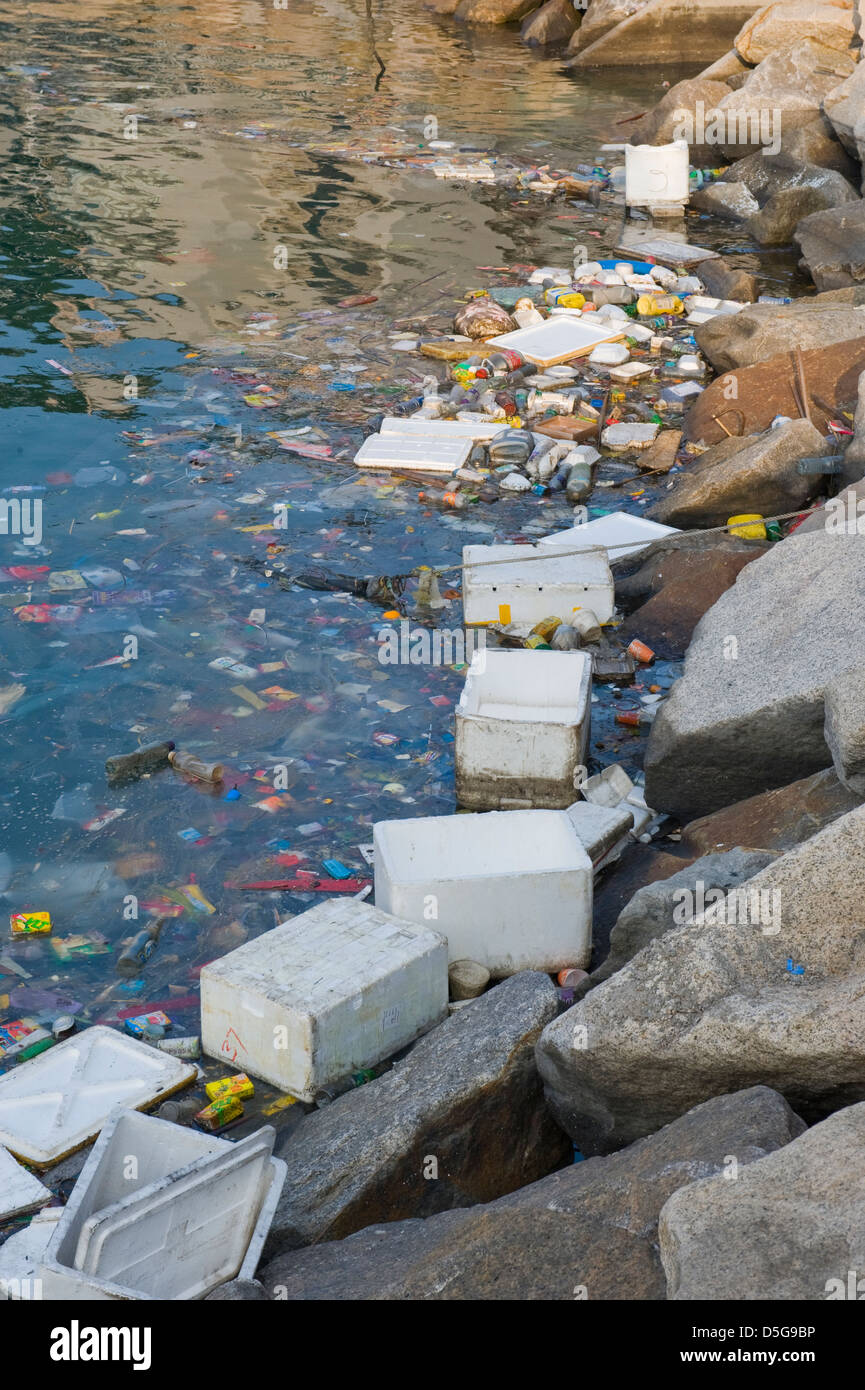 Waste plastic in bay Stock Photo - Alamy