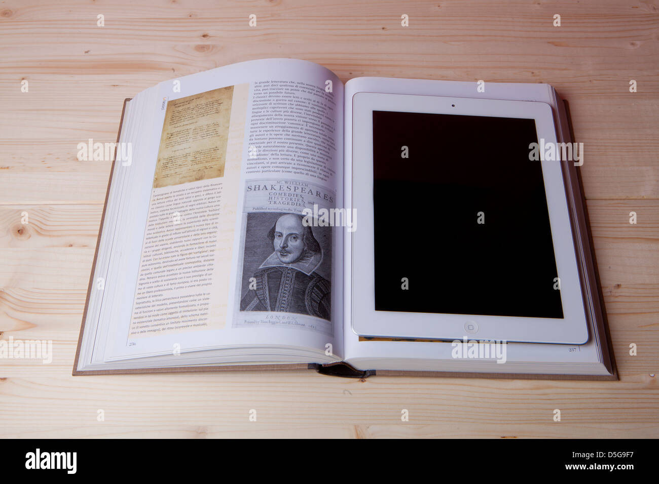 book and ipad Stock Photo - Alamy