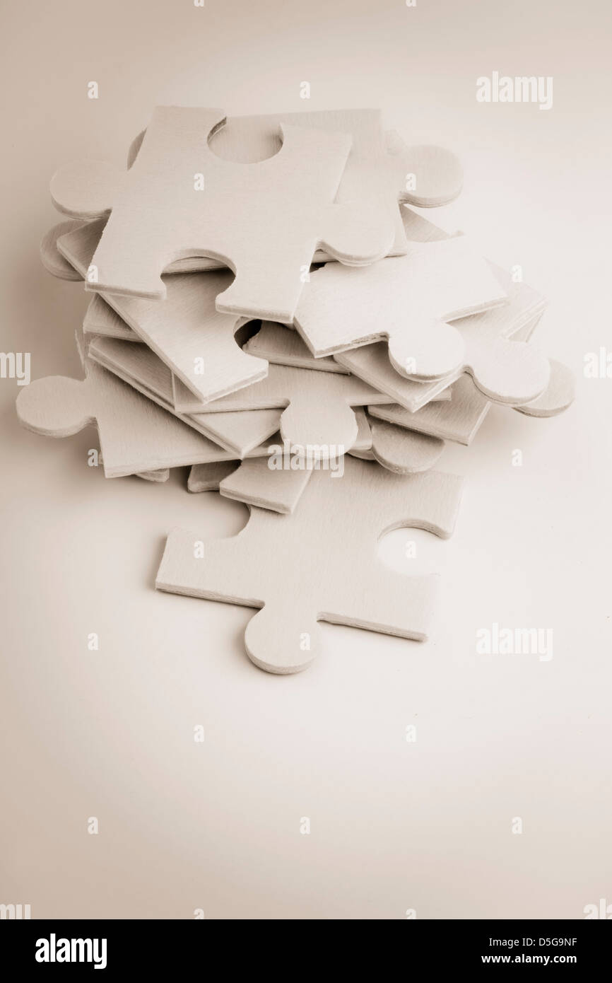 stack of jigsaw puzzle pieces Stock Photo - Alamy