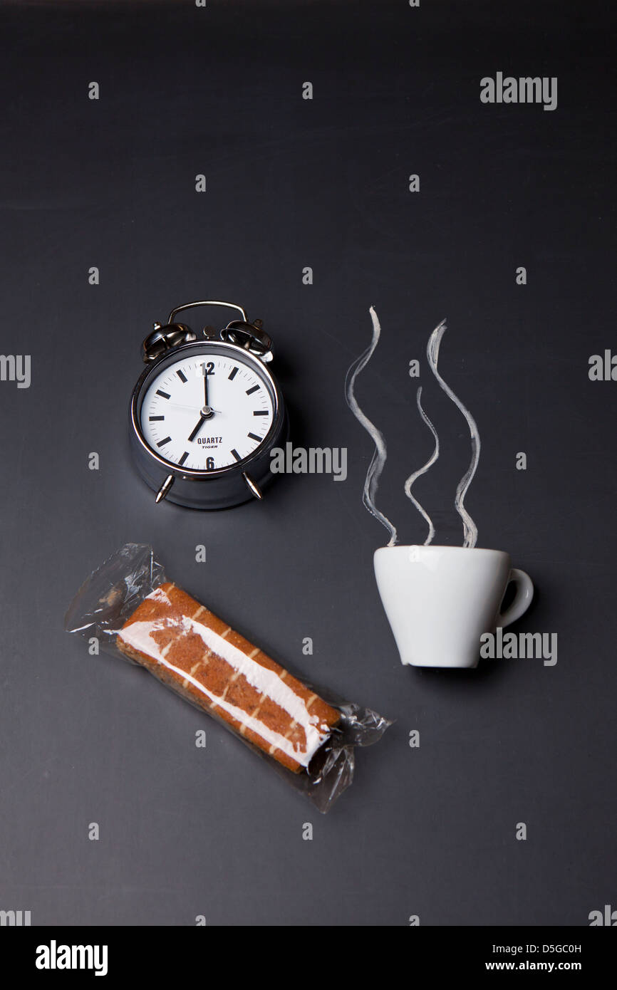 alarm clock,coffee and snack Stock Photo - Alamy