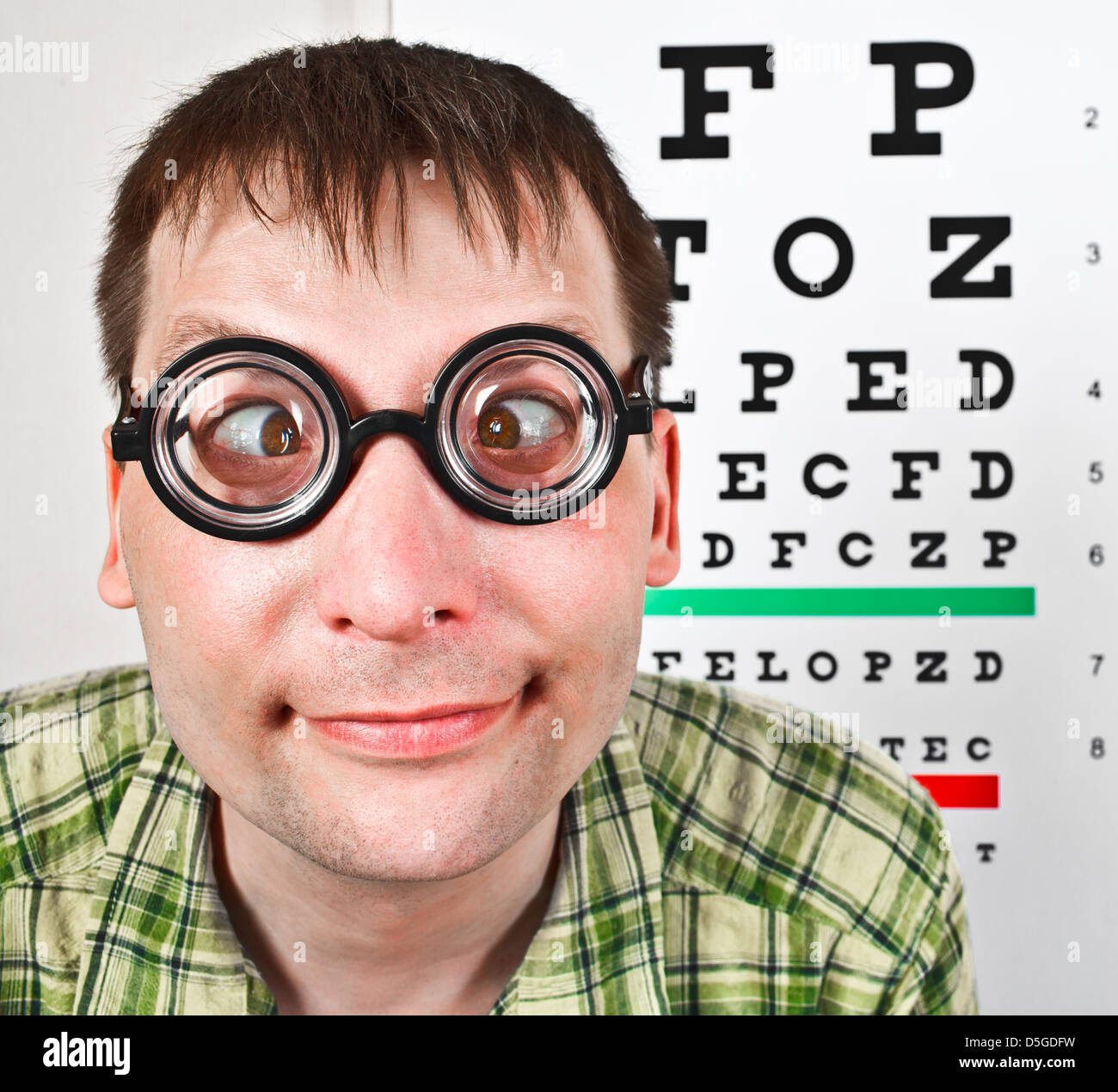 person wearing spectacles in an office at the doctor Stock Photo - Alamy